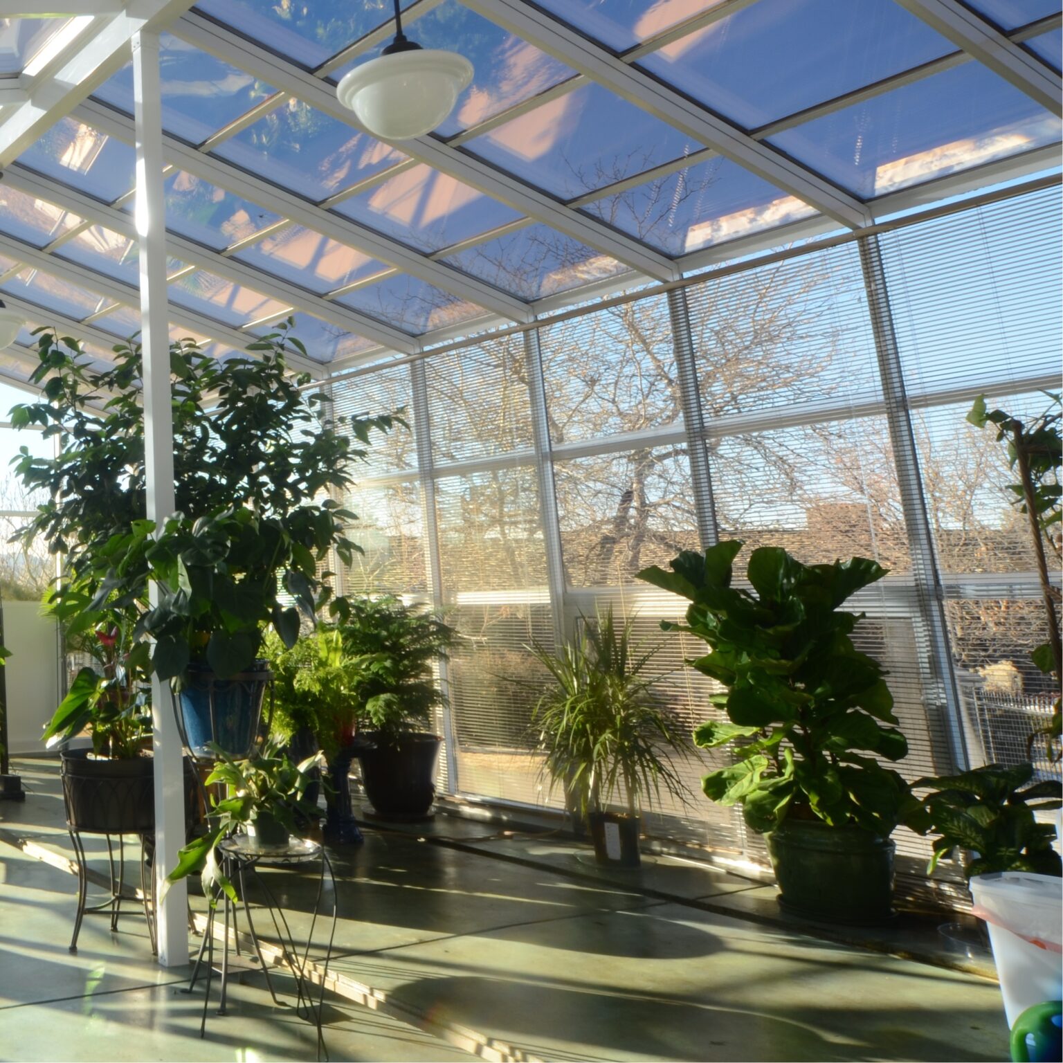 Transform Your Sunroom into a Wisconsin Winter Greenhouse | Kool View Transform Your Sunroom into a Wisconsin Winter Greenhouse | Kool View